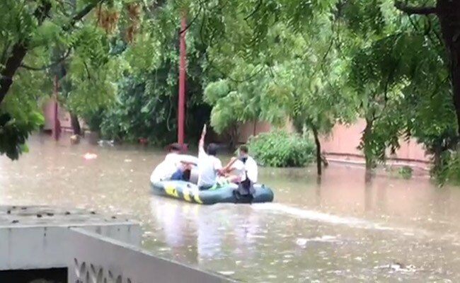Gurgaon Rain, Gurugram: Boat On Waterlogged Road, Submerged Underpasses ...
