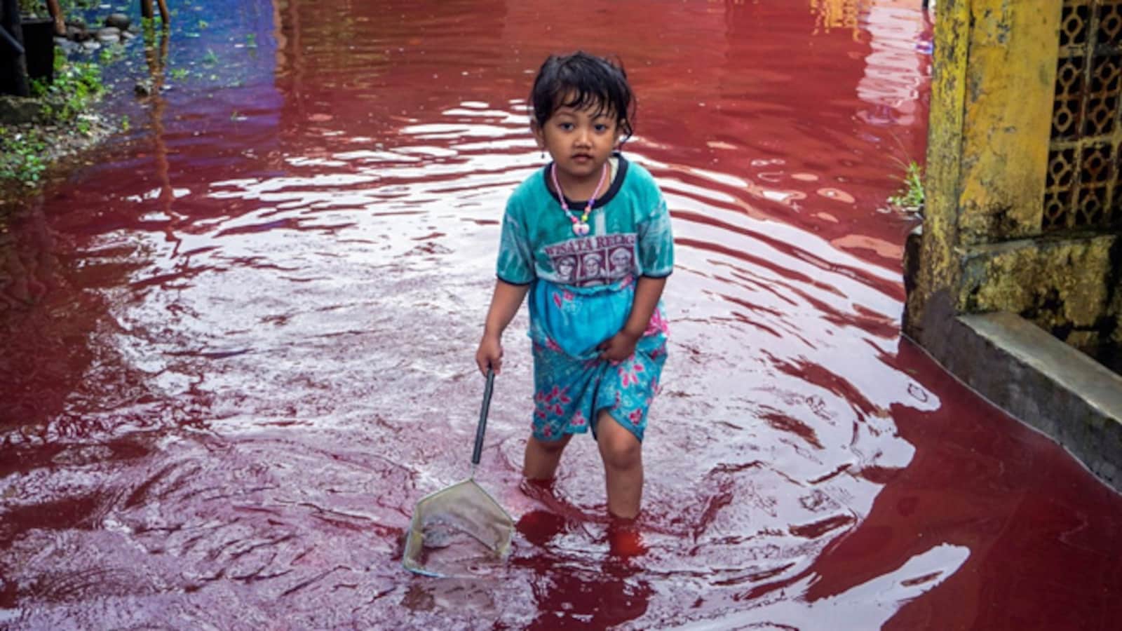 Indonesian Village Turns Red As Floods Hit Batik Manufacturing Hub