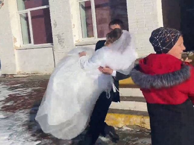 Slippery Steps Send Bride And Groom To The Ground