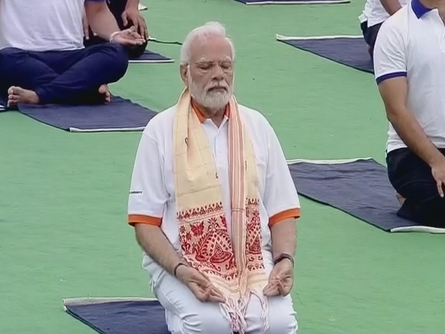 PM Modi Performs Yoga At Mysuru's Palace Grounds