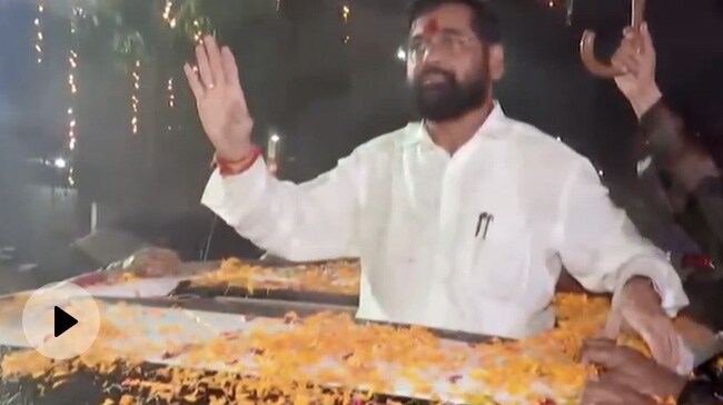 People Shower Flowers To Welcome Eknath Shinde At His Home