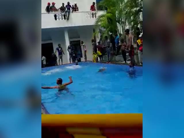 Watch: Protesters Swim In Lankan President's Pool