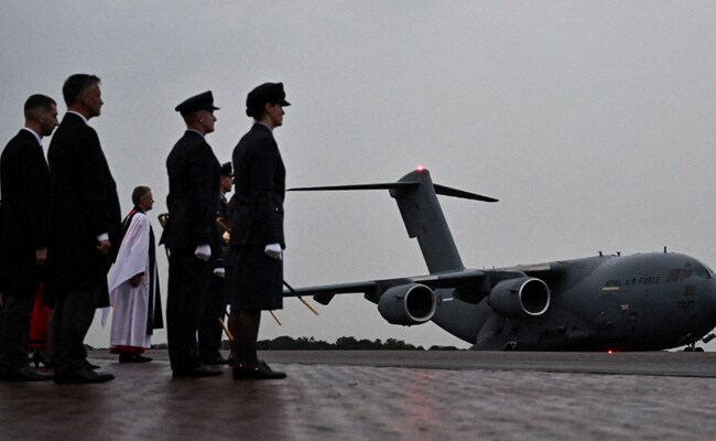 Queen Elizabeth: Plane Carrying Queen Elizabeth's Coffin Arrives In London