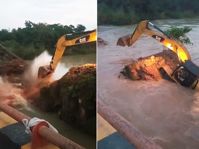 Video: Bulldozer Crashes Into Water Attempting to Demolish A Bridge In UP