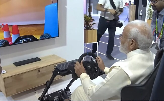 Watch: Prime Minister Narendra Modi "Drives Car In Europe" With 5G Link ...