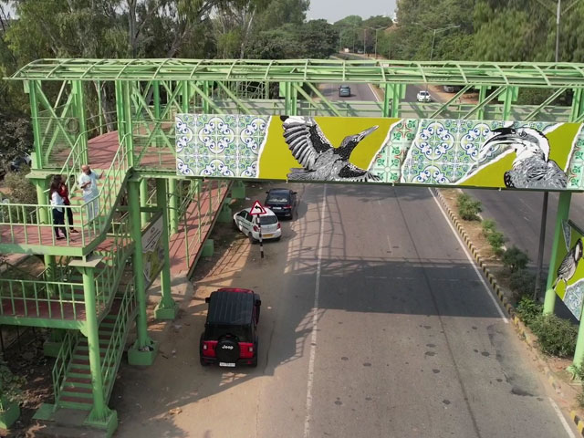Spreading Art Over A Rusted Foot Over Bridge In Gurgaon