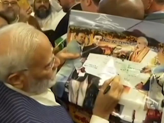 Watch: PM Modi Gives Autograph To Man Waiting For Him In New York