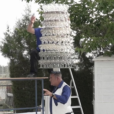 Cyprus Man Broke World Record After Balancing 319 Wine Glasses On His ...