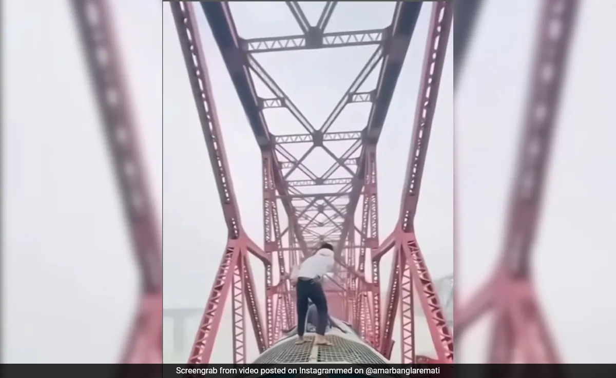 Watch: Man's Heart-Stopping Train Roof Stunt Leaves Internet Concerned
