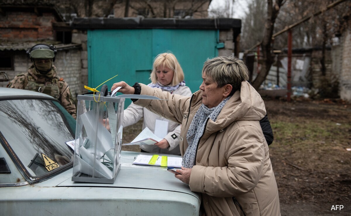 Russia Begins Voting As Ukraine Steps Up Border Attacks