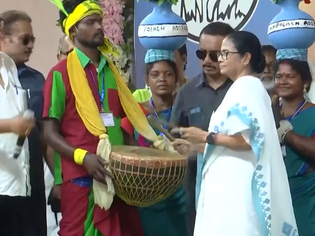 Mamata Banerjee Dances With Locals, Plays Folk Instruments