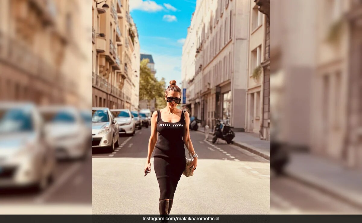 From A Backless Miu Miu Midi Dress To An Ivory Pantsuit, Malaika Arora ...