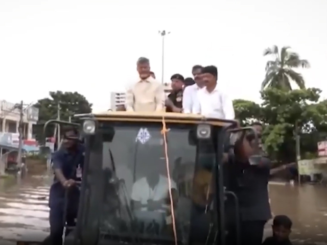 CM Chandrababu Naidu Visits Flood-Affected Areas On A JCB