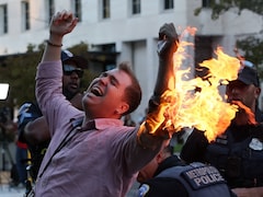 man set on fire protest