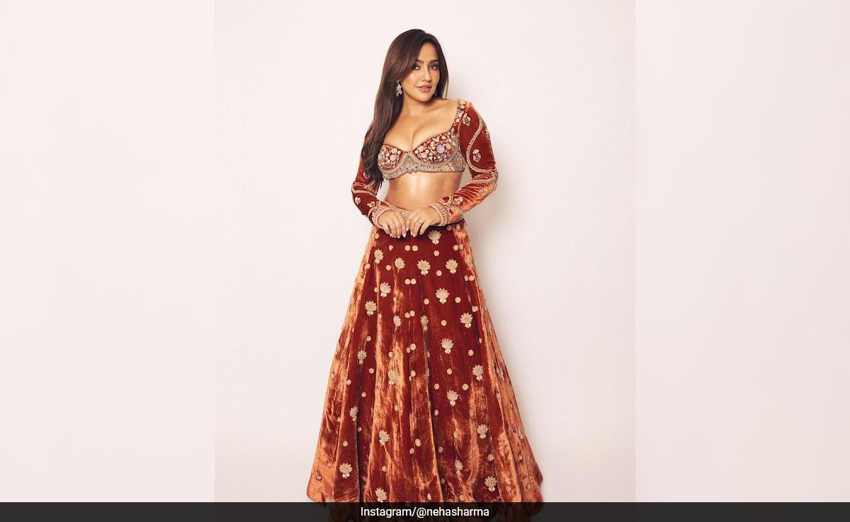 Neha Sharma In A Rust Velvet Embroidered Lehenga Brings Festive Glamour ...
