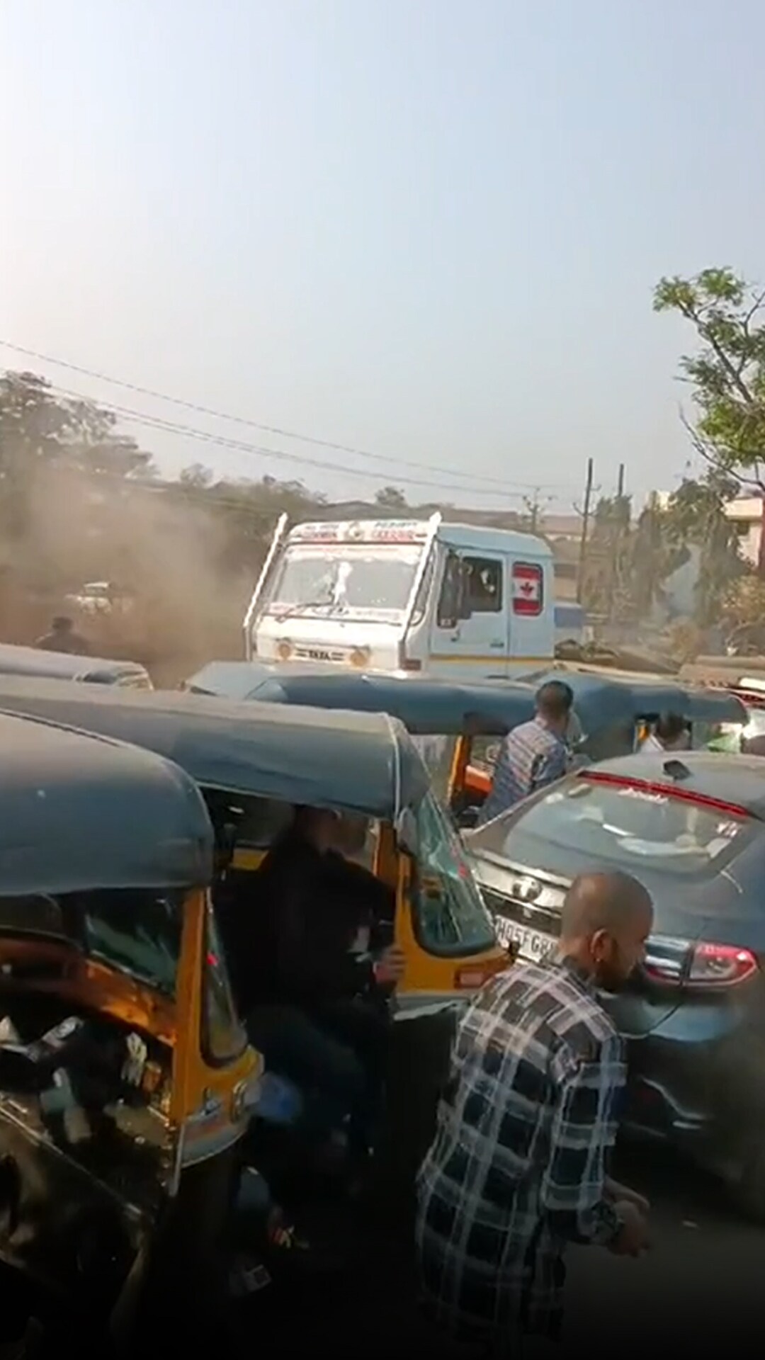 Video: Drunk Truck Driver Rams Vehicles, People Throw Stones To Stop Him