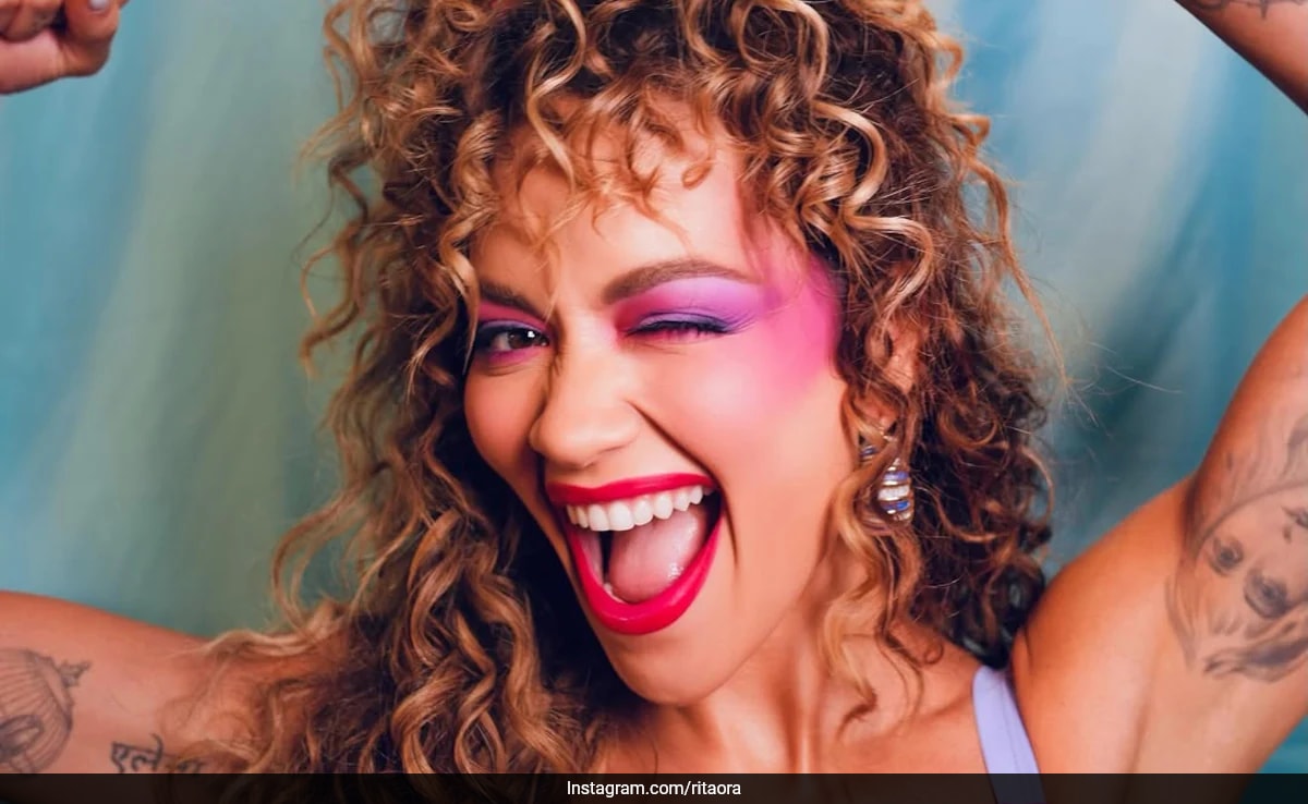 Rita Ora's Pretty-In-Pink Glam Is Complete With Statement Magenta ...