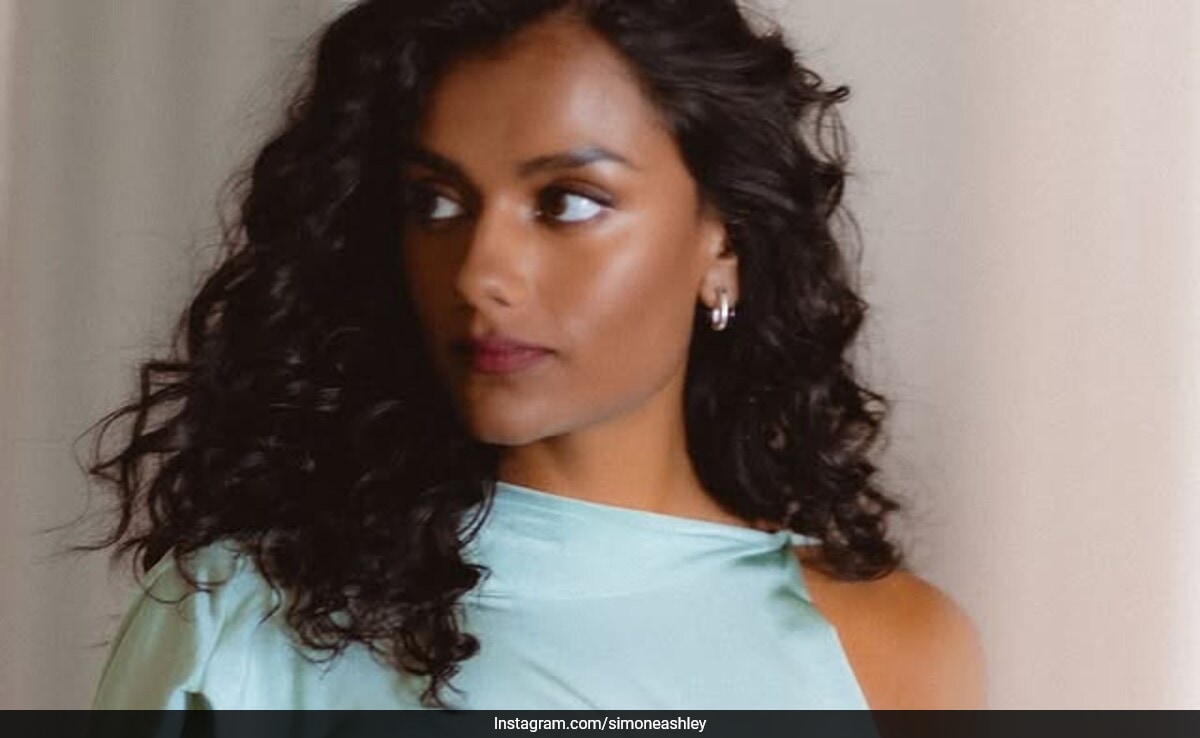 Simone Ashley Steals The Show In A Backless Powder Blue Silk Gown At ...