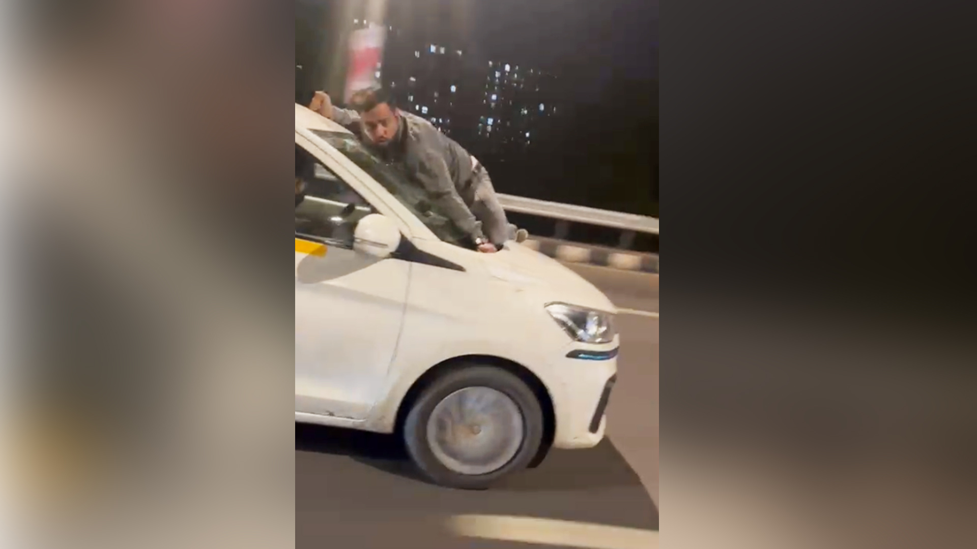 Man Clings Onto Bonnet As Cab Driver Races Down Mumbai Road