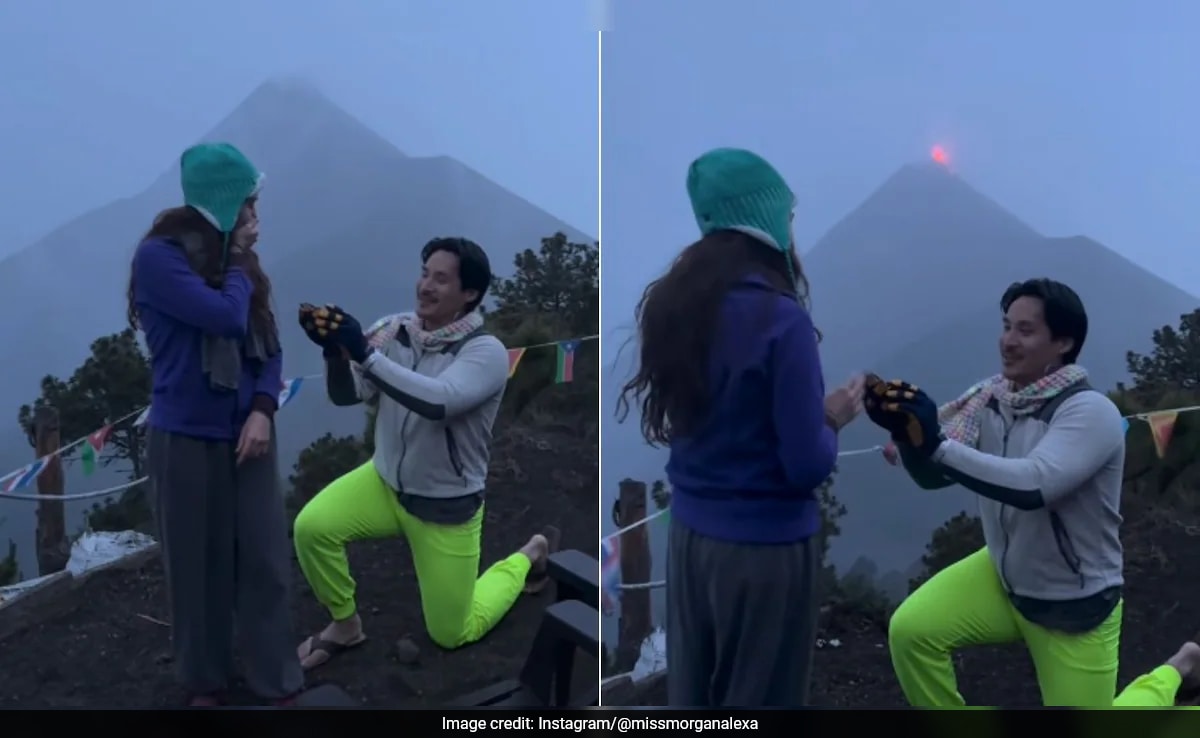 Volcano Erupts In The Background While Man Proposes To His Girlfriend ...