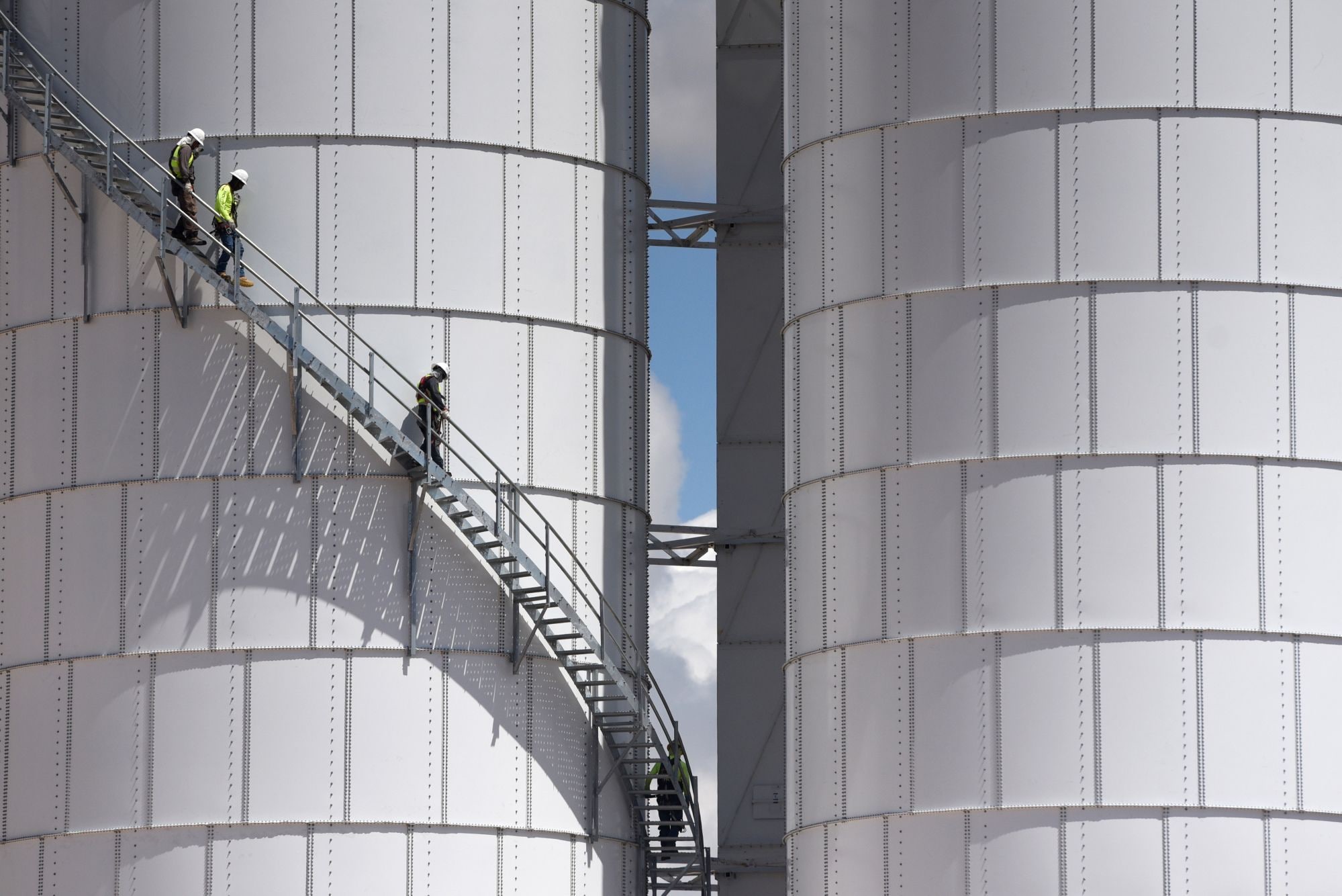 Oil Pares Large Weekly Drop After US Jobs Data Tames Dollar