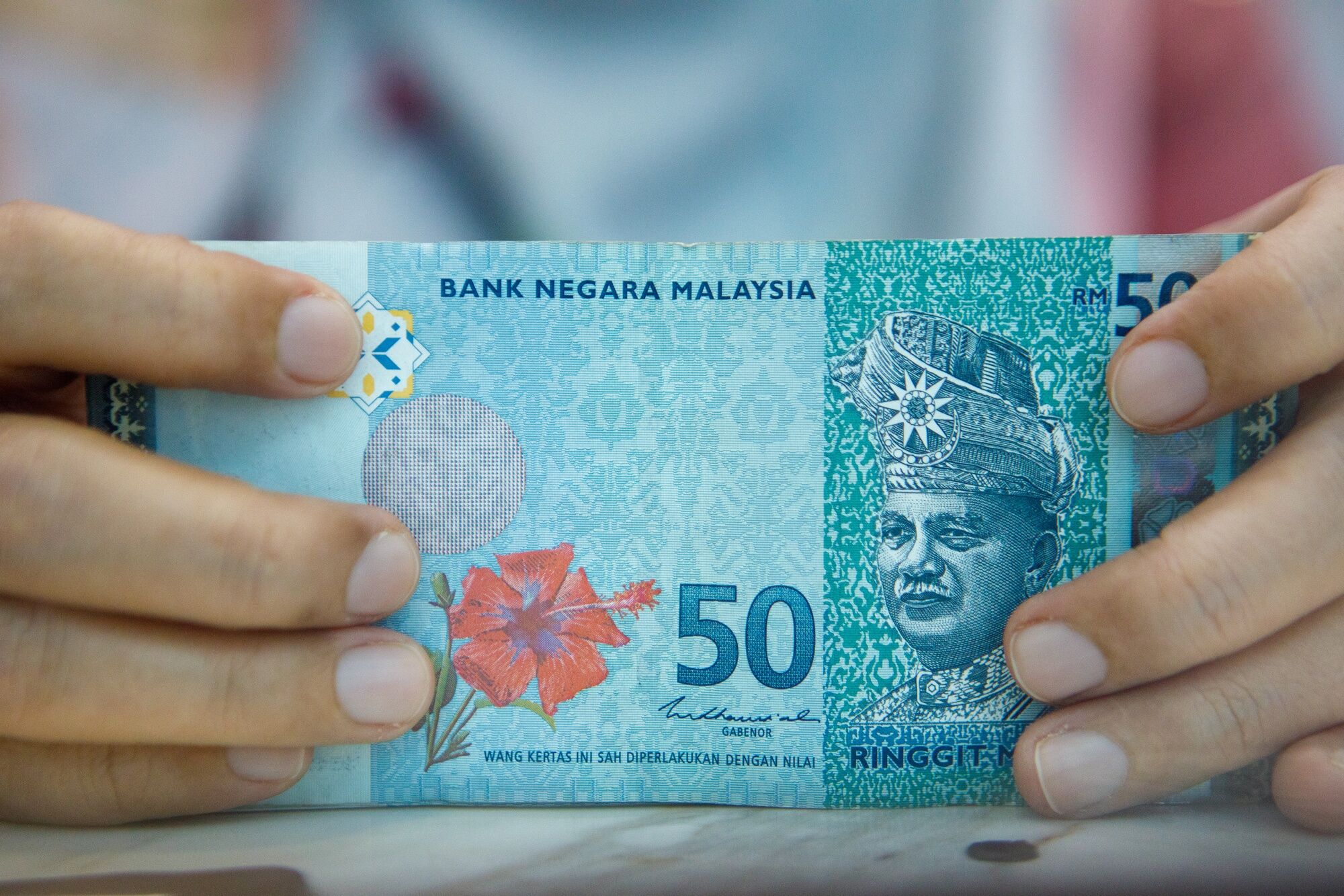 Ringgit Falls to 25-Year Low, the Worst Performer in Asia After Yen ...