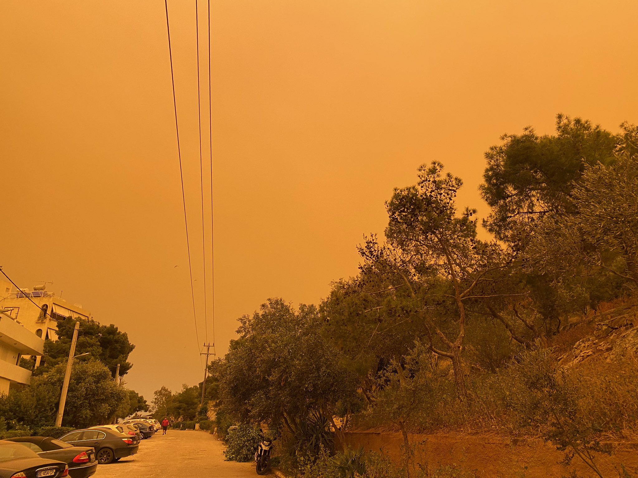 Skies Over Athens, Libya Turn Orange And Red For This Reason | WATCH