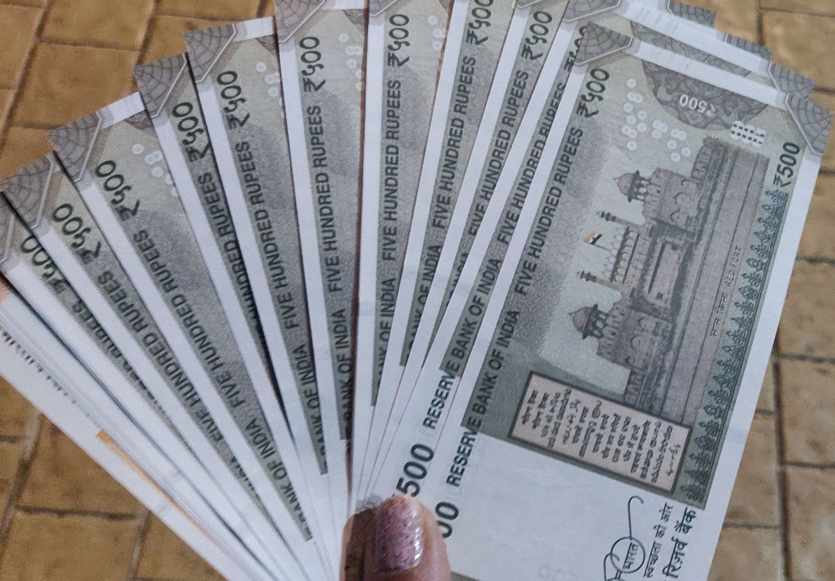 Rupee Ends With Gains Against Dollar