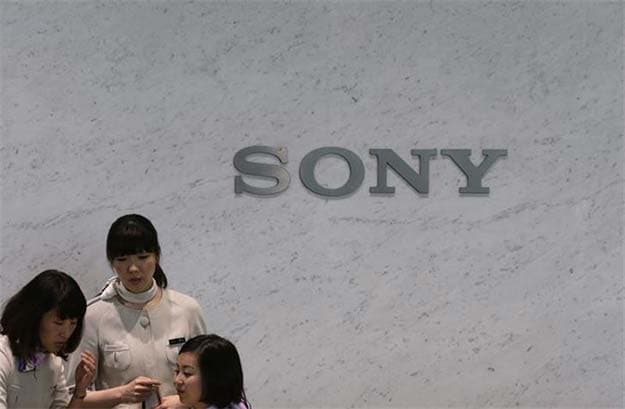 Sony posts quarterly loss, cuts outlook as TVs slip back into red