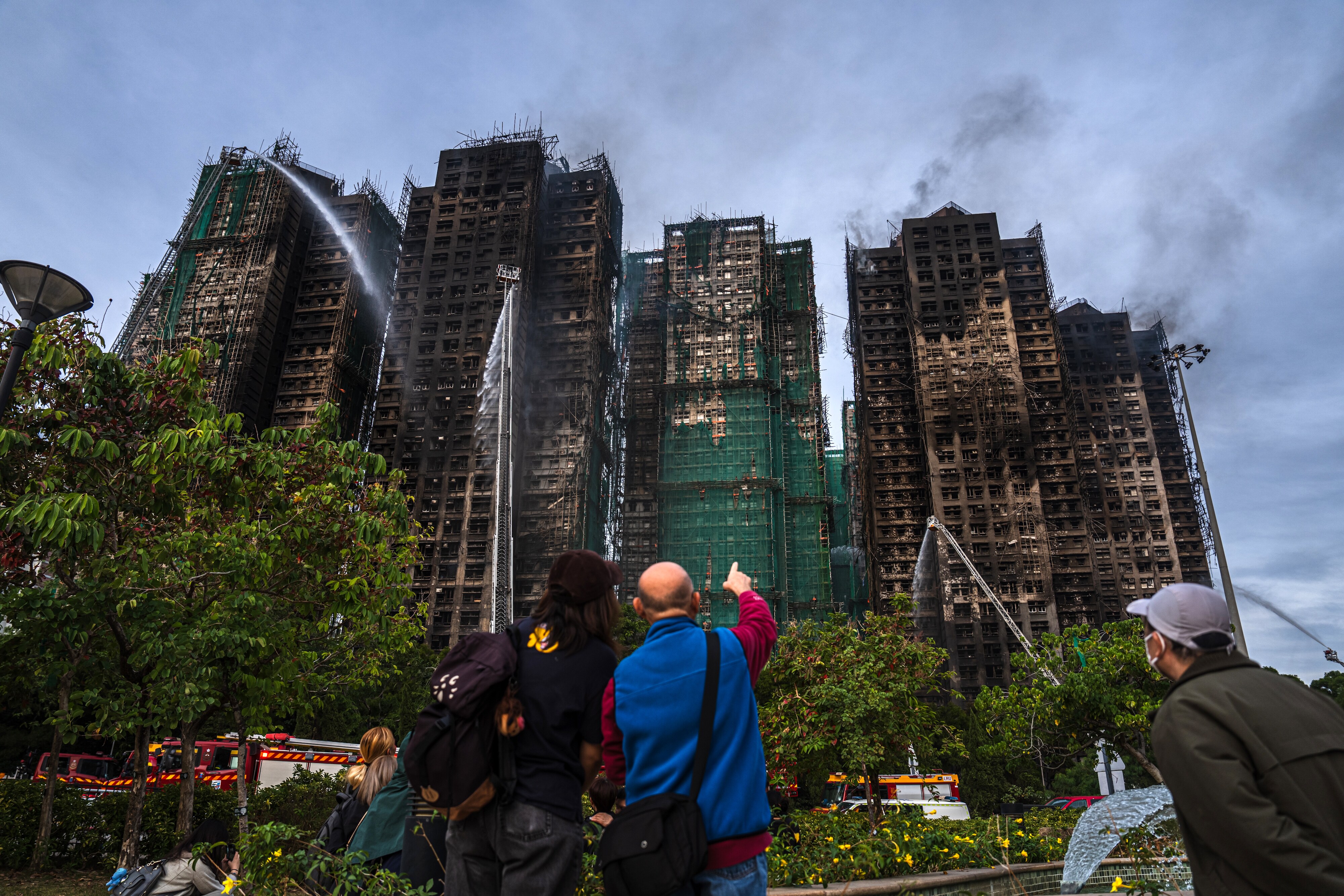 Hong Kong Blaze Death Toll Climbs to 128, Arrests Widen