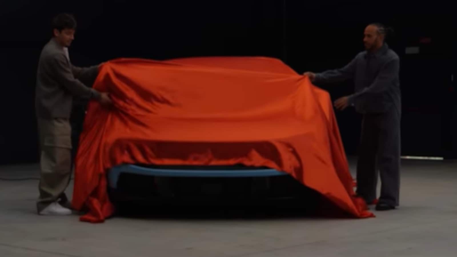 Charles Leclerc And Lewis Hamilton Unveil Ferrari's First-Ever Electric Car