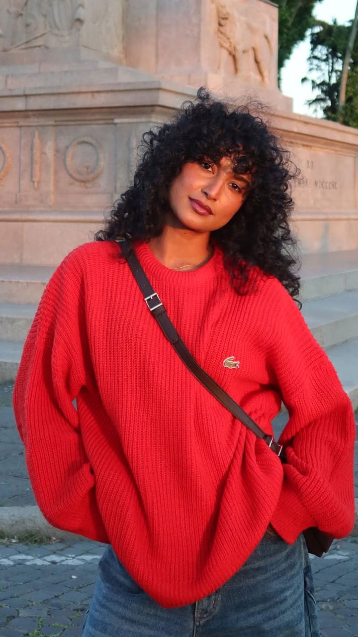 Rida Tharana Stuns In A Chic Red Top And Denim Look